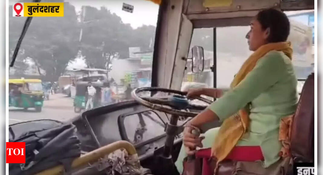 Breaking Barriers: Woman becomes bus driver in UP, husband assists her ...