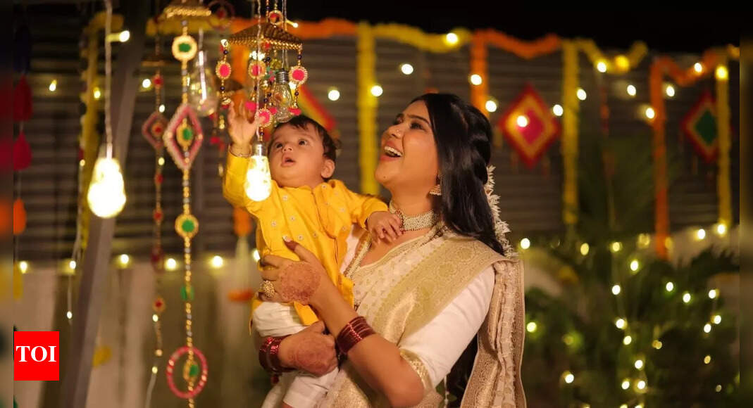 Khushi Shah's radiant Diwali moment: Actress poses with son Krishang ...