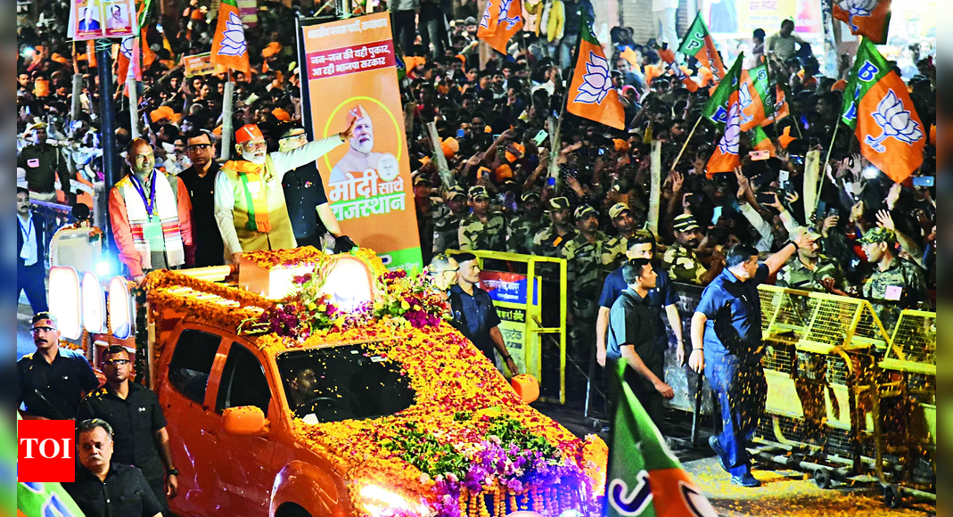 Modi Roadshow: Walled City turns saffron as Modi holds roadshow ...