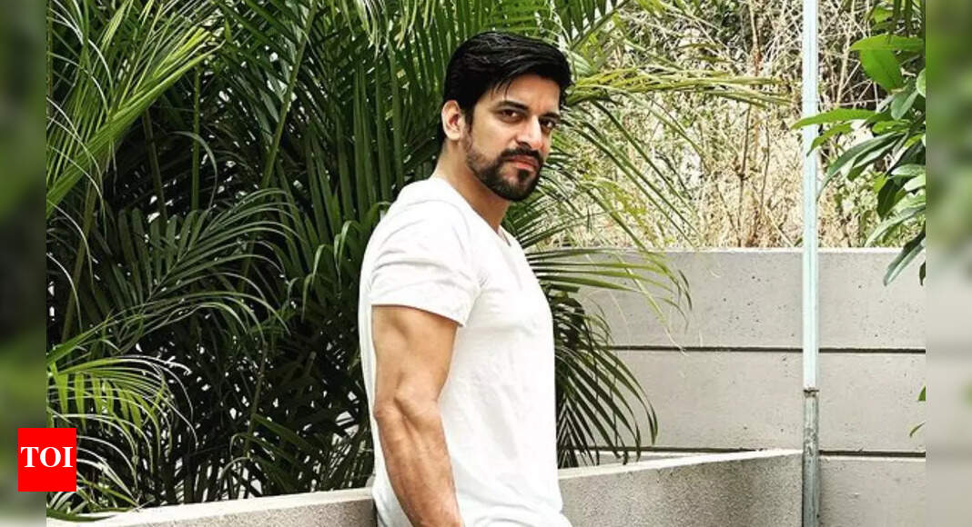 Actor Aditya Shukla reacts to Australian cricketer Mitchell Marsh putting his feet on the ...