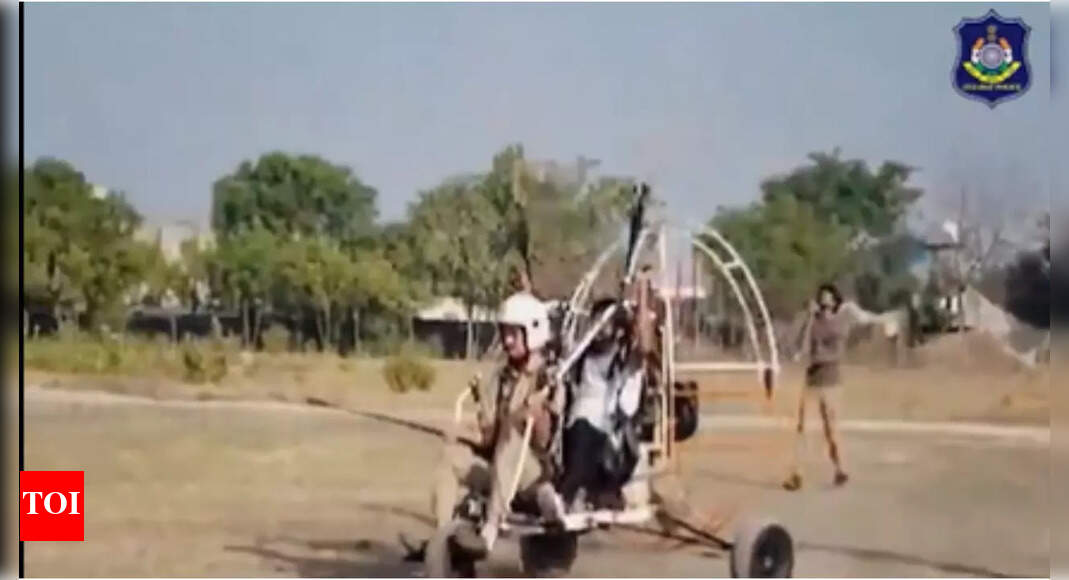 Watch: Gujarat police uses paragliding to monitor the city - Times of India