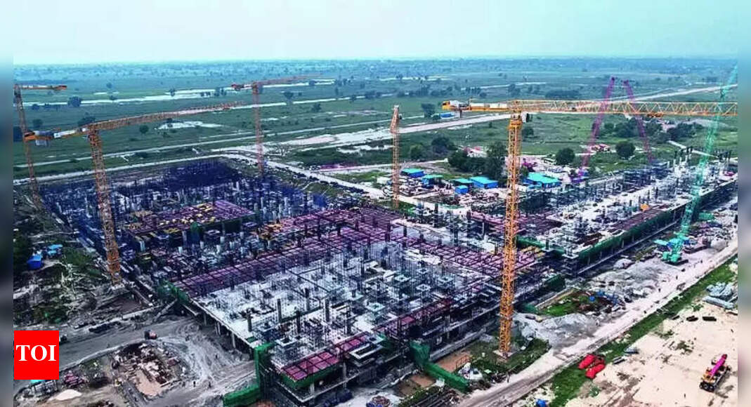 Noida Airport: Work On Noida Airport Gathers Momentum, Final Floor Of ...