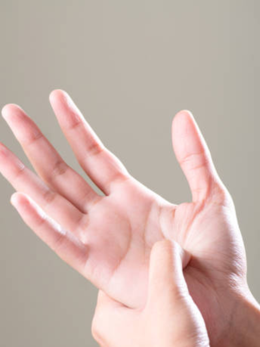 Pressing these points on your hands can alleviate stress and other ...