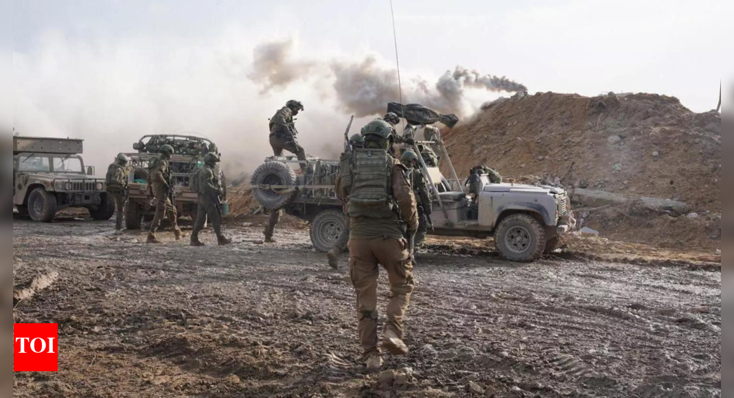Israeli forces recover the bodies of a civilian, two soldiers held in ...