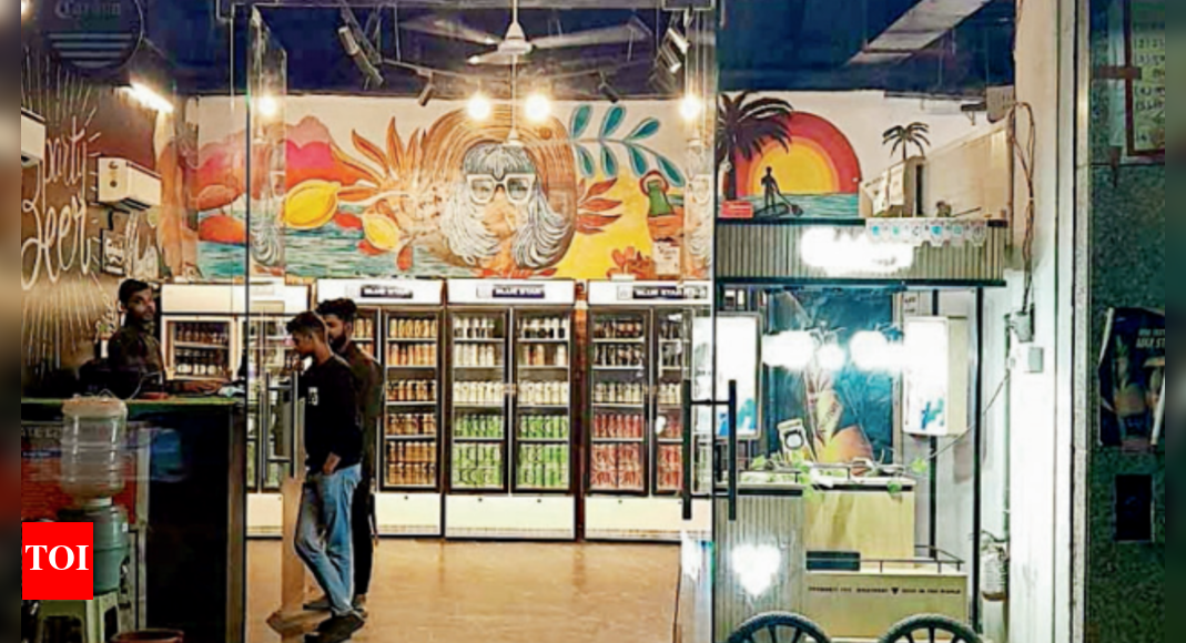 Spreading cheer: Beer shops in UP can have their own drinking area | Noida News - Times of India