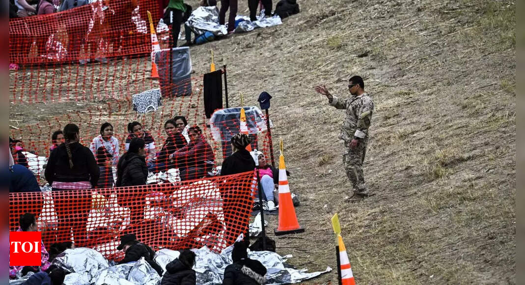 10k migrants day: US border states shut entry points - Times of India