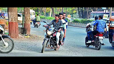 Triple-Seat Riders: Nashik Police to Crack Down on Triple-Seat Riding ...