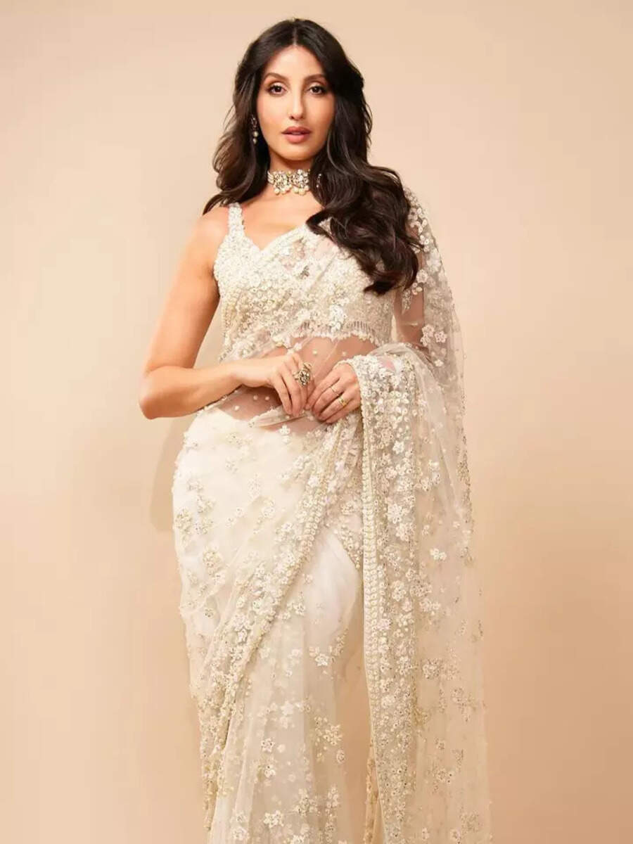 Nora Fatehi exudes princess vibes in an ethereal ivory saree | Times of ...