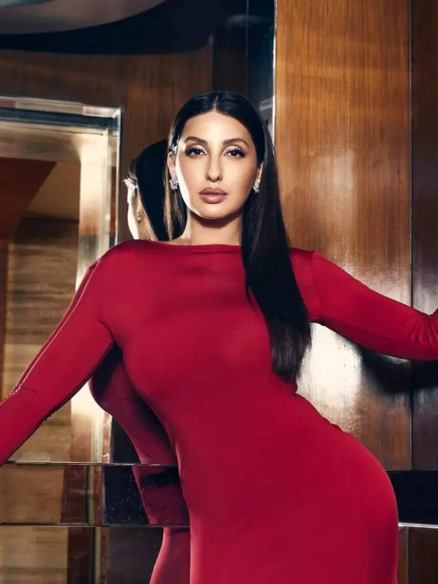 Nora Fatehi is fashionably fierce in a red bodycon dress | Times of India