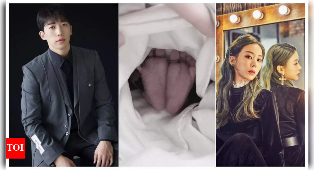 U-KISS's Hoon and former Girl's Day member Hwang Jisun celebrate the arrival of their first ...