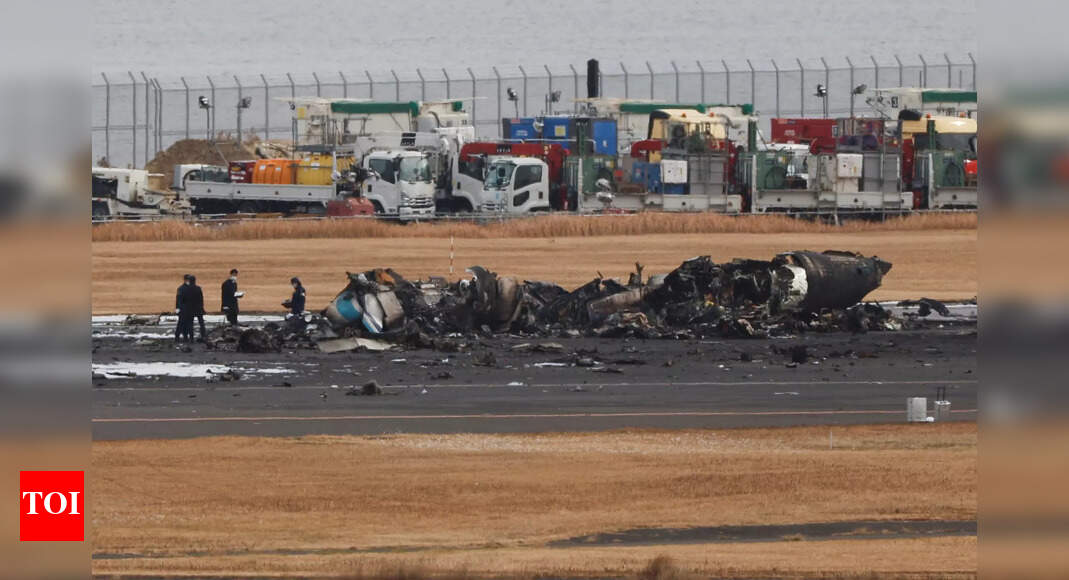 Crews begin clearing plane wreckage from Japan runway collision - Times ...