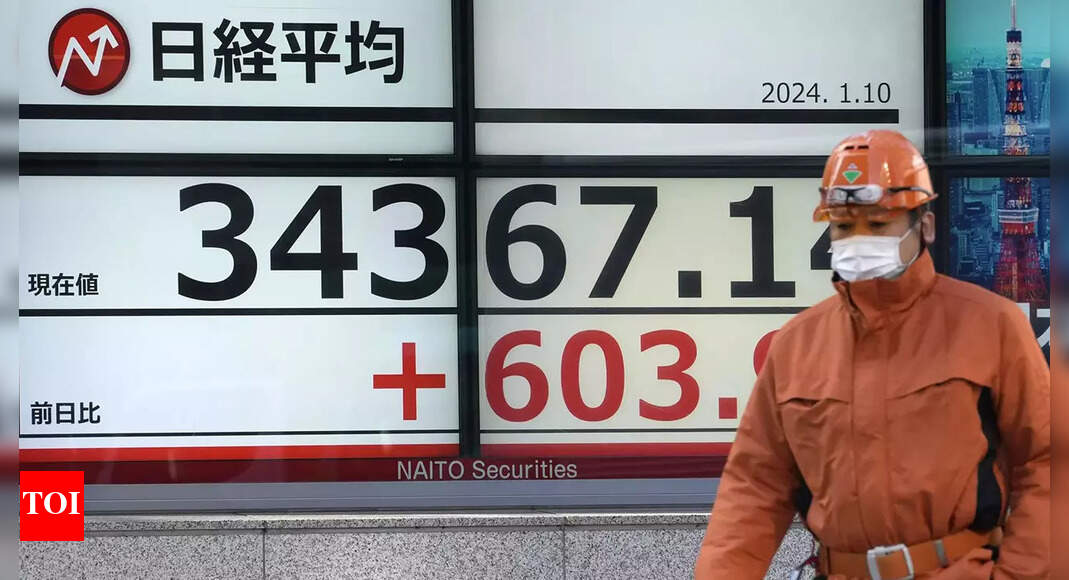 Deflation's end? Nikkei hits highest since 1990s - The Times of India