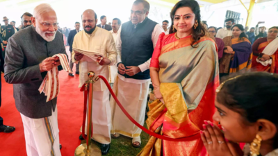 PM Modi gifts his shawl to girl during Pongal celebrations | India News ...