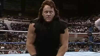 The Undertaker's first opponent Mario Mancini announces his in-ring ...
