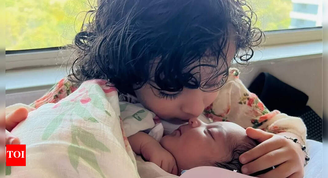 Nila welcomes her newborn sister with a sweet kiss, mommy Pearle Maaney ...