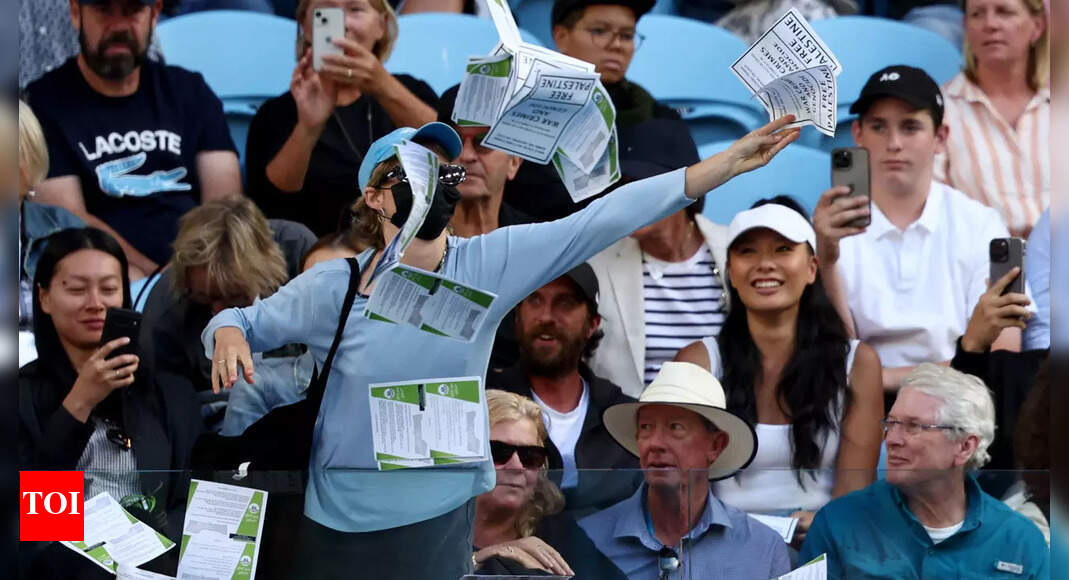 Protester briefly disrupts Australian Open match with political message ...