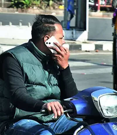 Mobile Clamped To Their Ears, Zooming Past Traffic & Sense | Bhopal ...