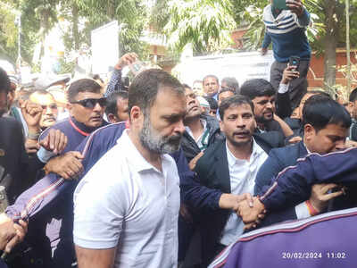 Rahul Gandhi appears before court in defamation case, granted bail | India News - Times of India