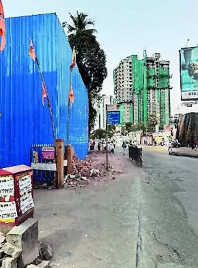 Malad Building: Part of Malad building demolished for road widening ...