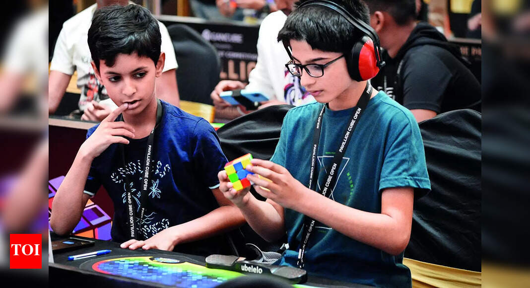 Speedcubing: Superfast Twists and Quick Turns: The Rise of Speedcubing ...