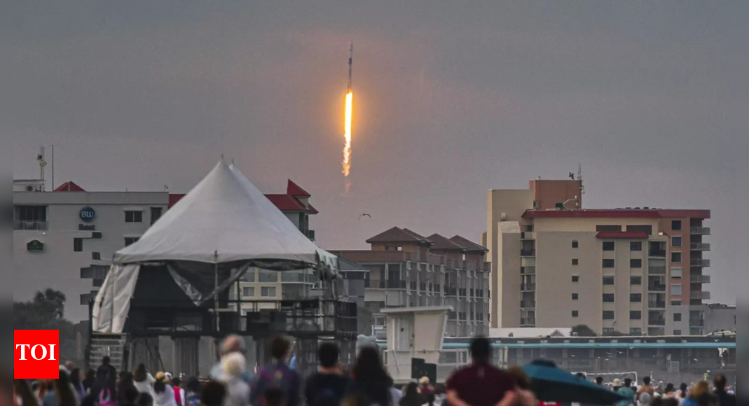Nasa astronaut, 3 others return to Earth on SpaceX rocket after six months in orbit - Times of India
