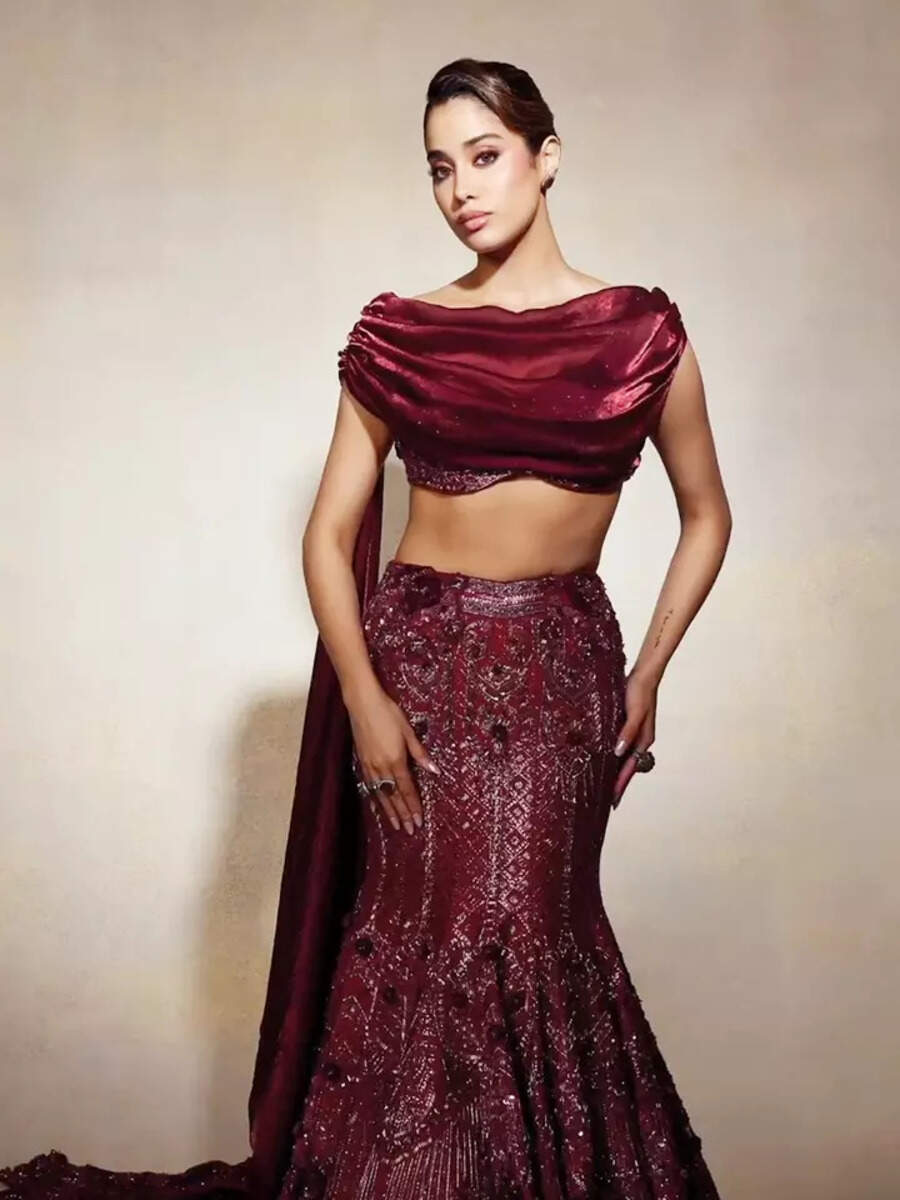 Janhvi Kapoor is a vision to behold in a maroon mermaid lehenga | Times ...