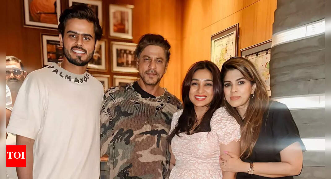 Shah Rukh Khan poses with Nitish Rana and wife Saachi Marwah after KKR ...