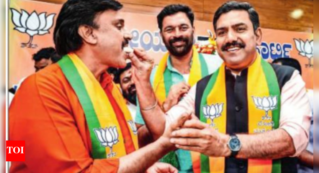 Reddy joins BJP, merges party too | Bengaluru News - Times of India