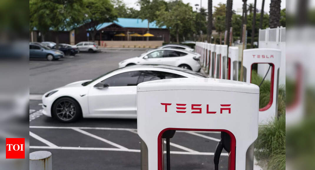 'Tesla in talks with Reliance for India EV plant' - Times of India