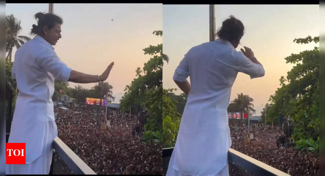 Shah Rukh Khan waves to a sea of fans who arrive outside Mannat on Eid ...