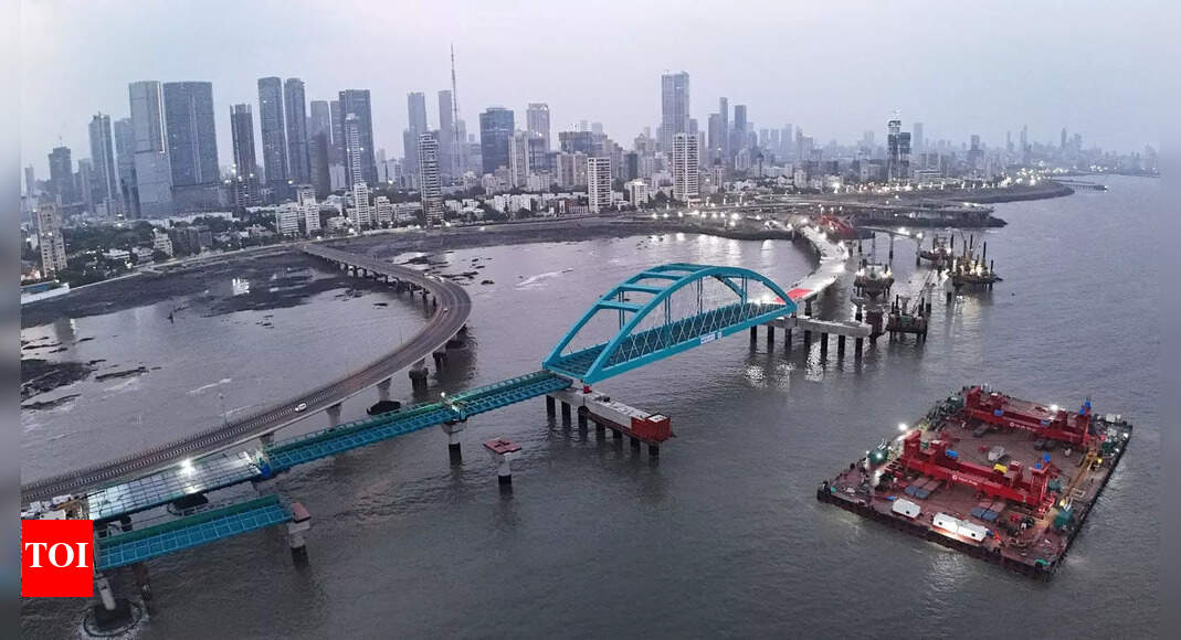 Coastal road bow string arch bridge erected | Mumbai News - Times of India