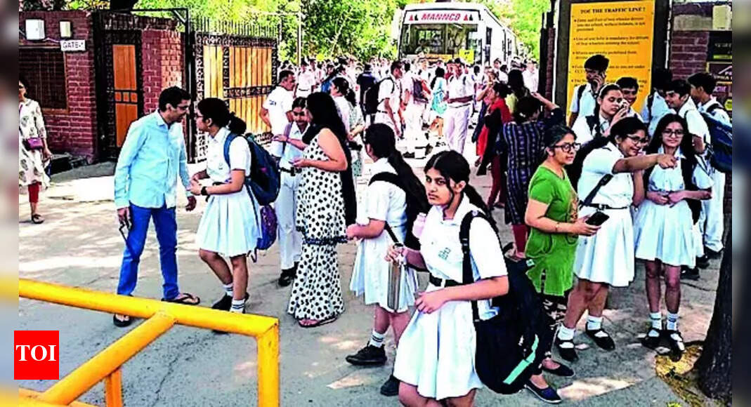 Delhi-NCR schools bomb threat: Parents show up, vandalise school gate | Noida News - Times of India