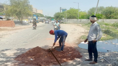 Repair of roads, footpaths, and streetlights begins in Noida's 100x ...