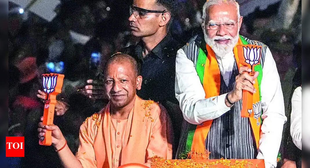 PM Modi's 2 km-long roadshow in city draws huge crowd amidst tight ...