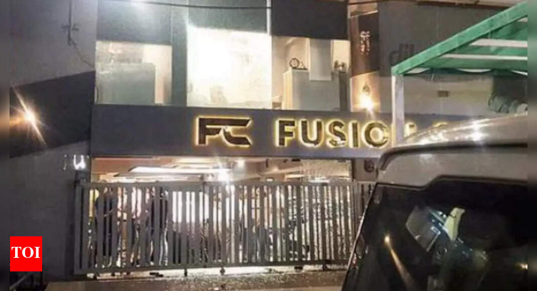 'Rs 5 crore protection money': Armed men open fire at car showroom in ... 'Rs 5 crore protection money': Armed men open fire at car showroom in ...