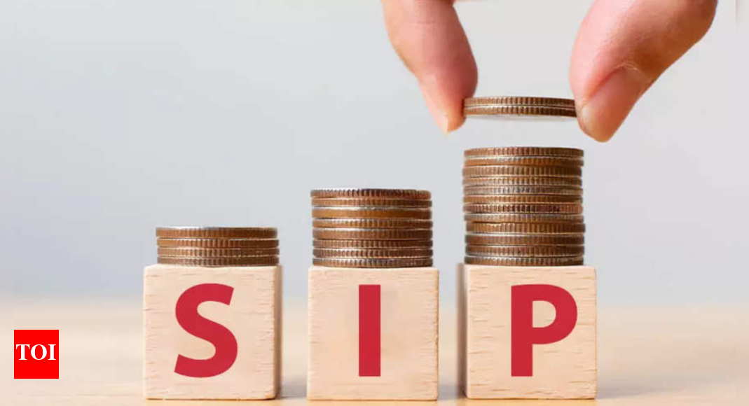 SIP flows scale Rs 20,000 crore mark 1st time - Times of India