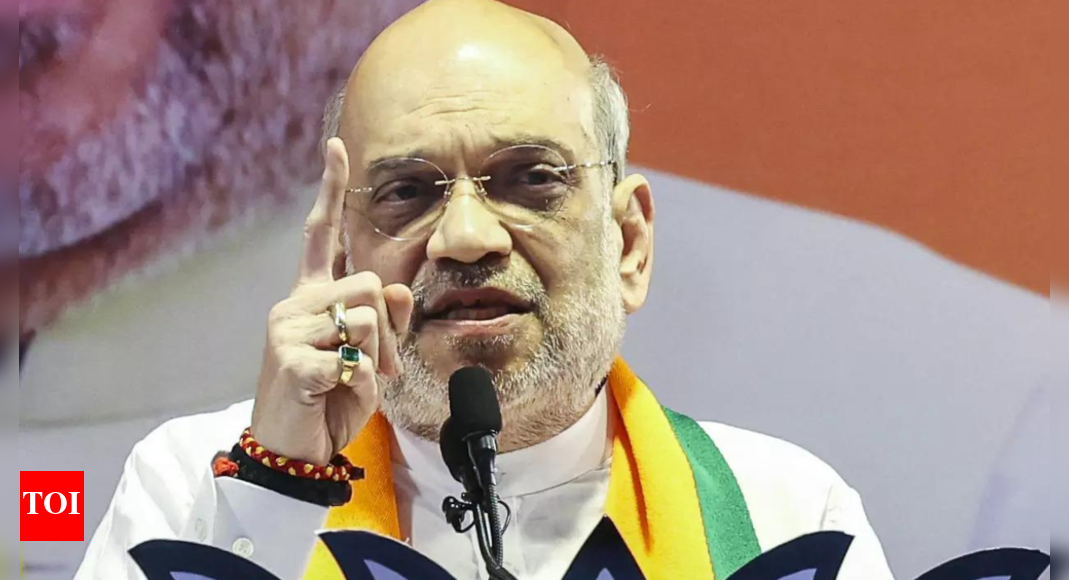 What’s your stand, Amit Shah asks Rahul Gandhi as he renews POK dare | India News - Times of India