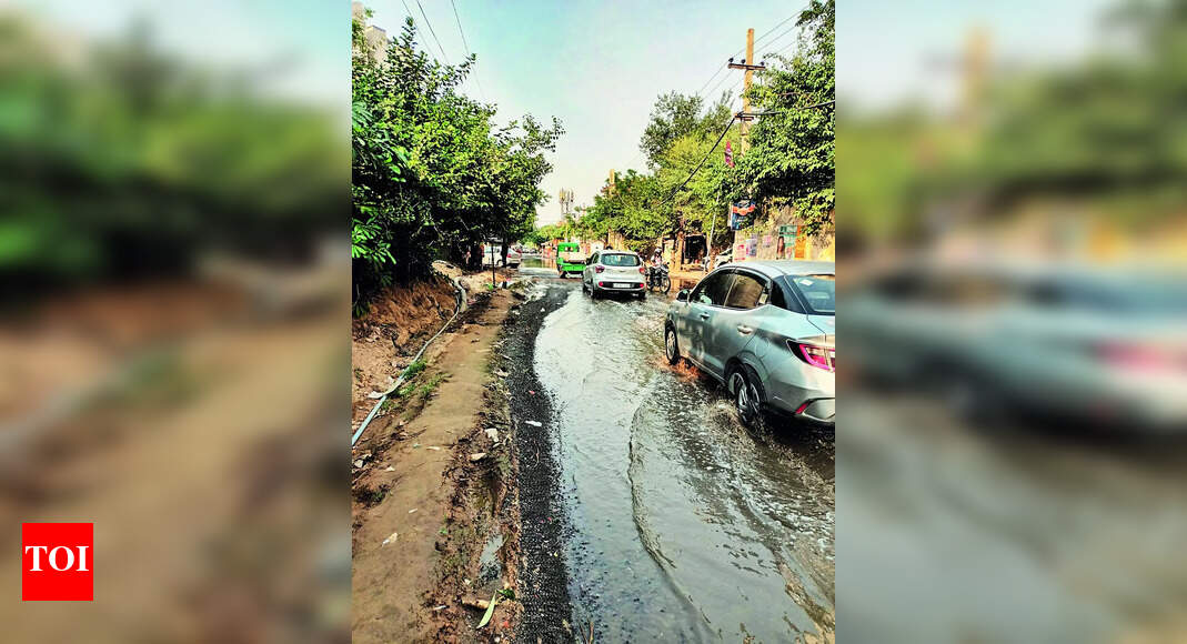 Road Accidents: Overflowing drains & potholes: This road is an accident ...