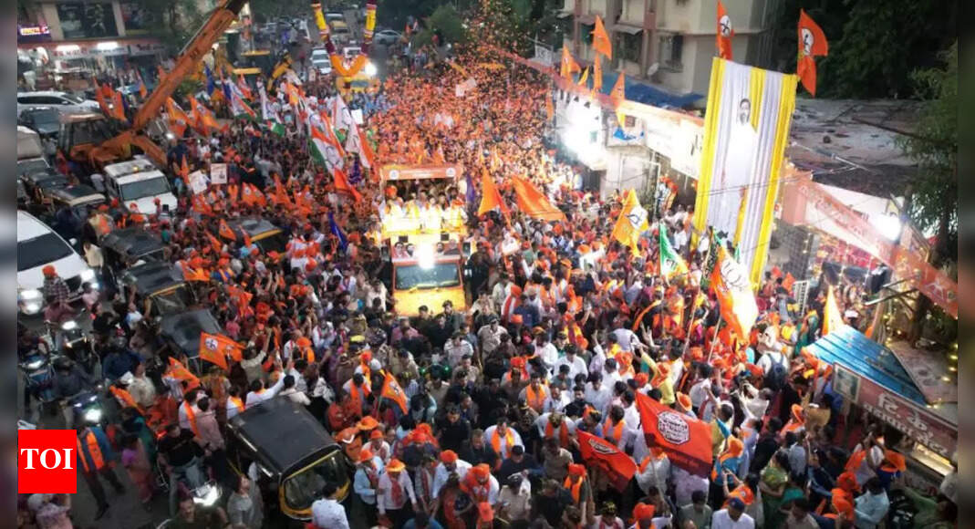 CM Eknath Shinde's mega roadshow for Shrikant Shinde amid rain in Dombivli, says son will win ...