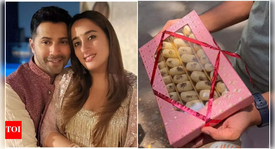 Varun Dhawan's staff treats paparazzi with sweets as actor welcomes ...