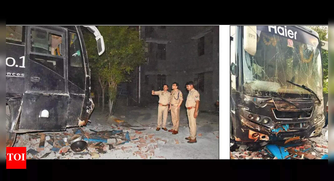 Bus crashes into food carts, condo wall in Noida; 1 dead | Noida News - Times of India
