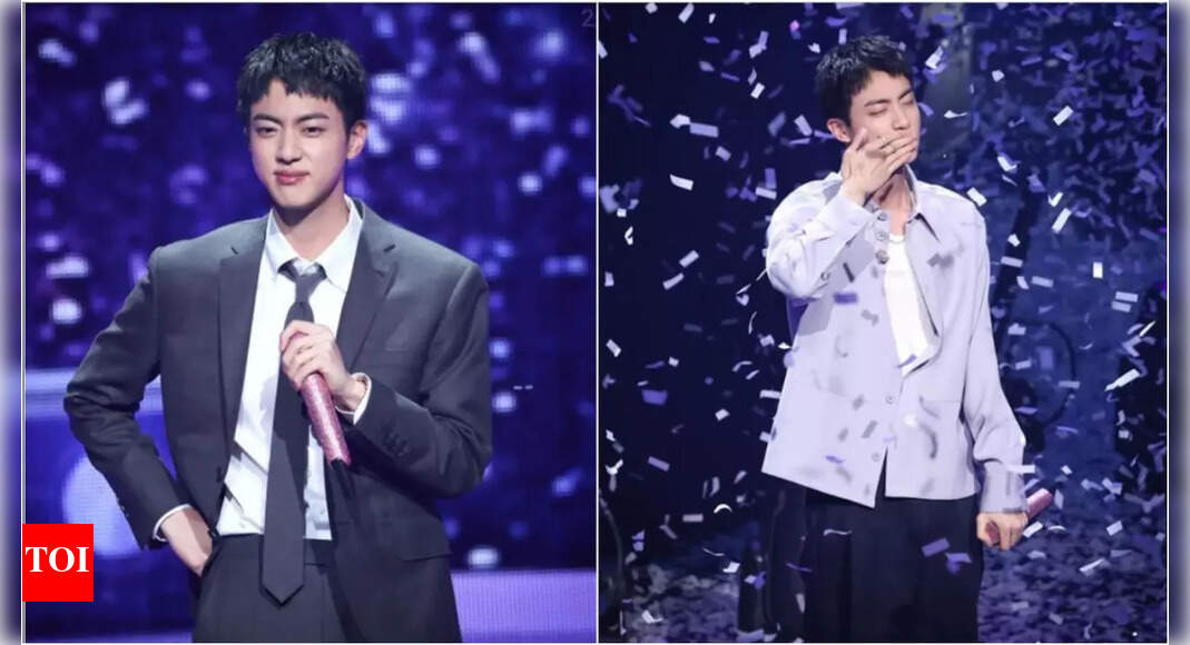 BTS Jin touches fans hearts with special flower bouquet gift at free hug event | - Times of India