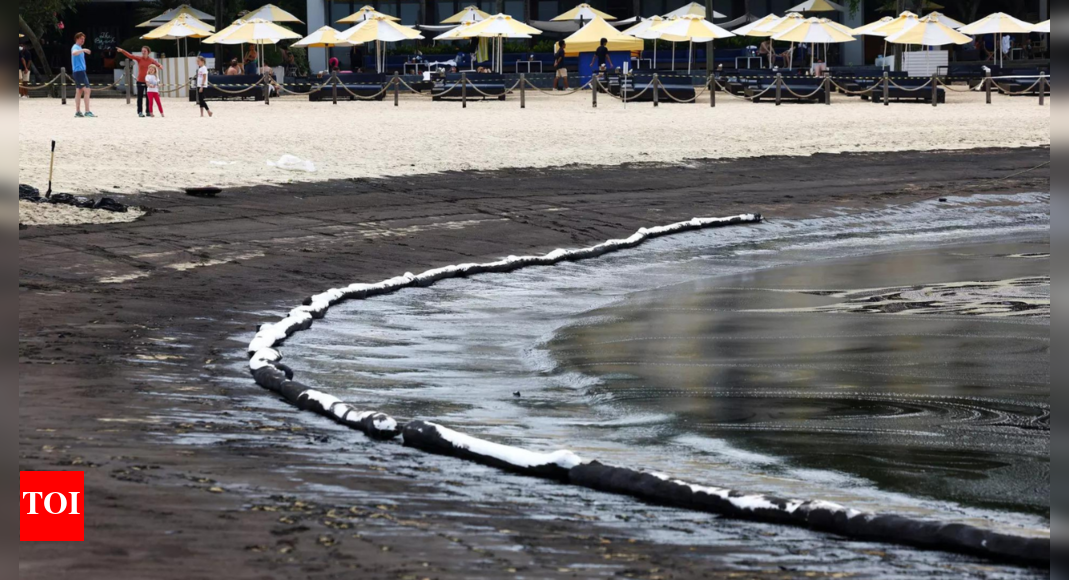 Singapore's Sentosa island beaches closed due to oil spill - Times of India