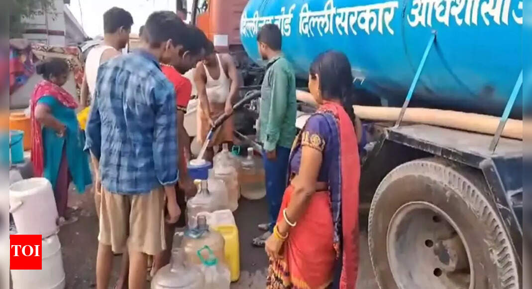 Delhi water crisis: Long queues continue to form near tankers across ...