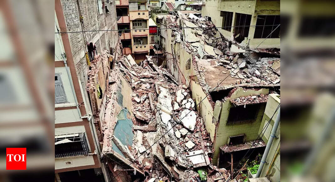 Building Collapse: Two residential buildings collapse, cook injured ...