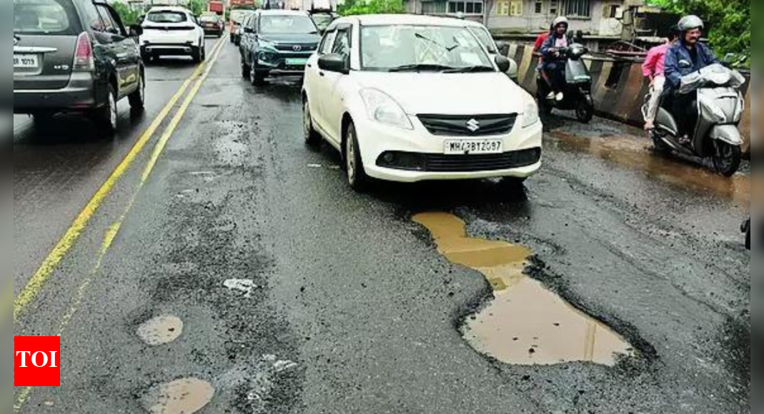Toddler falls from bike due to pothole, dies | India News - Times of India