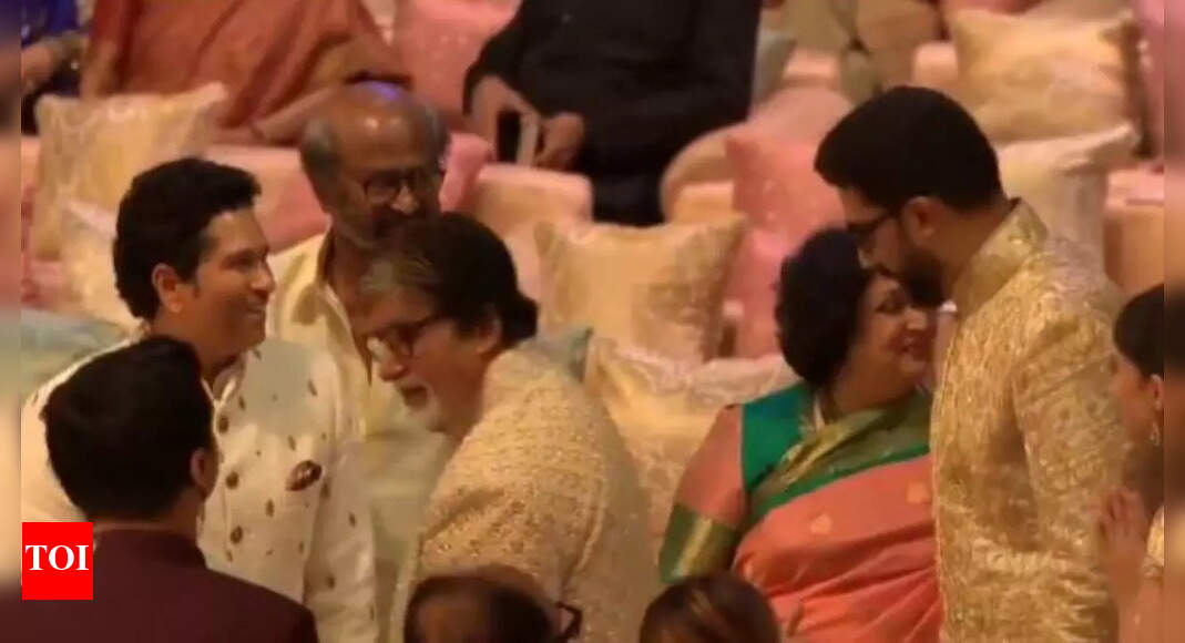 Sachin Tendulkar touches Amitabh Bachchan's feet, hugs Abhishek ...