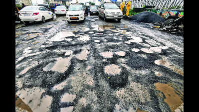Potholes: Potholes Resurface in Mumbai After Recent Repairs, Civic ...