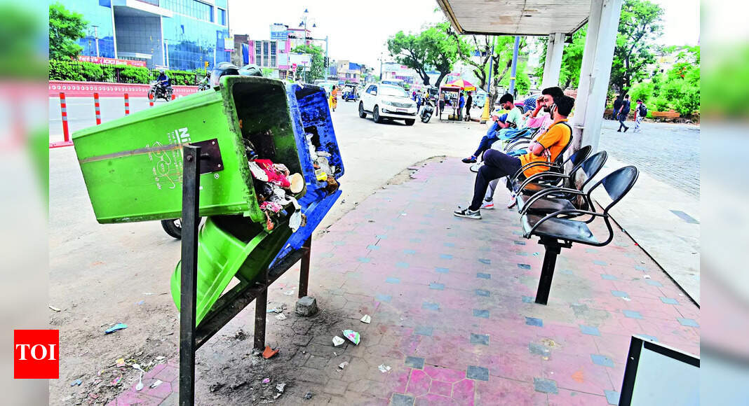 Garbage Bins: Open Garbage Bins at Bus Stops in City Causing Commuter ...