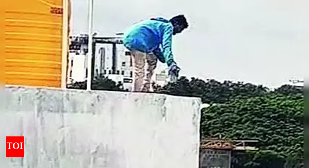 Man Threatens: Man threatens to jump off building due to family issues | Bengaluru News - Times ...